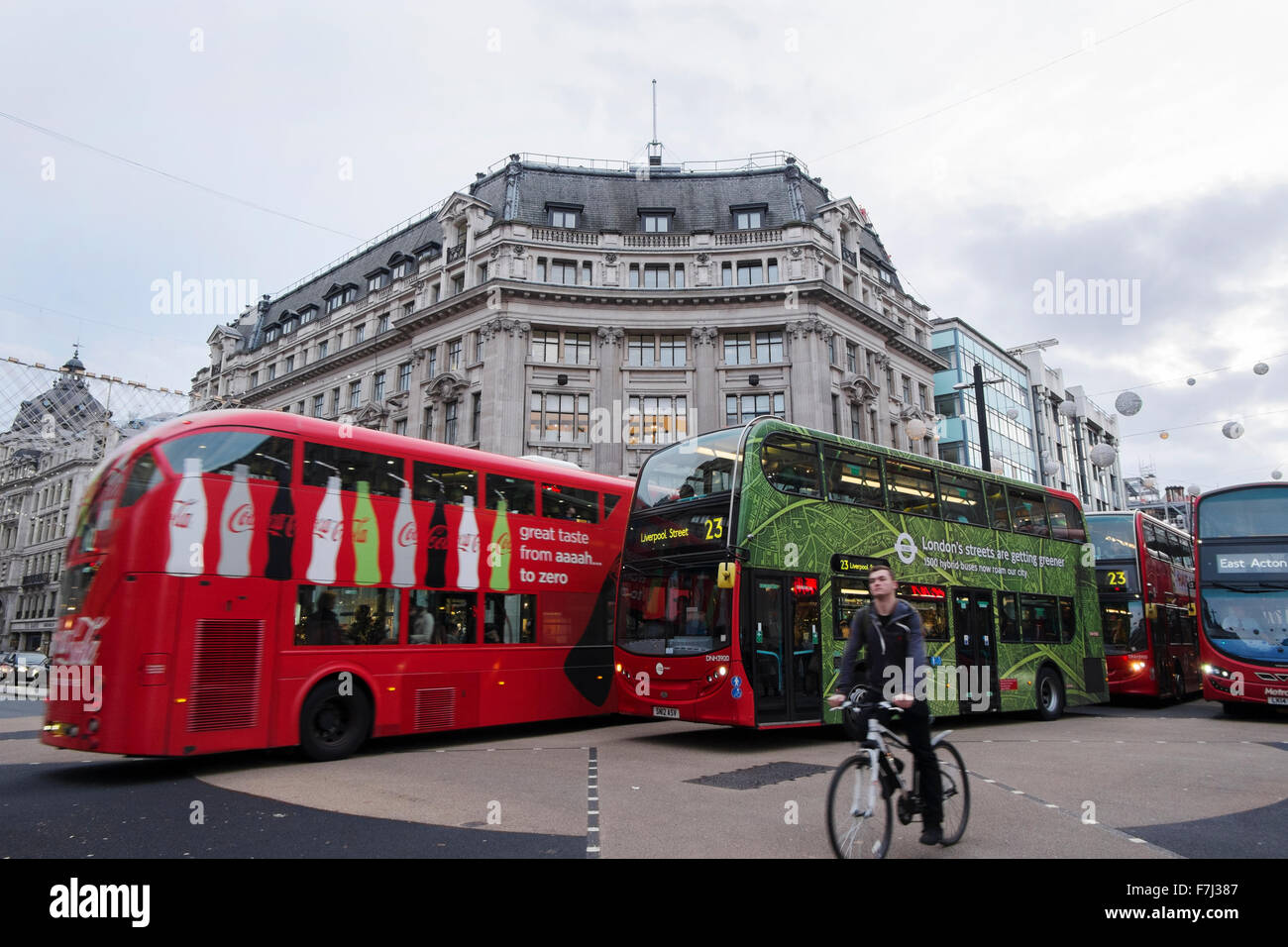 Buses driving through Oxford Circus in London, England, UK Stock Photo ...