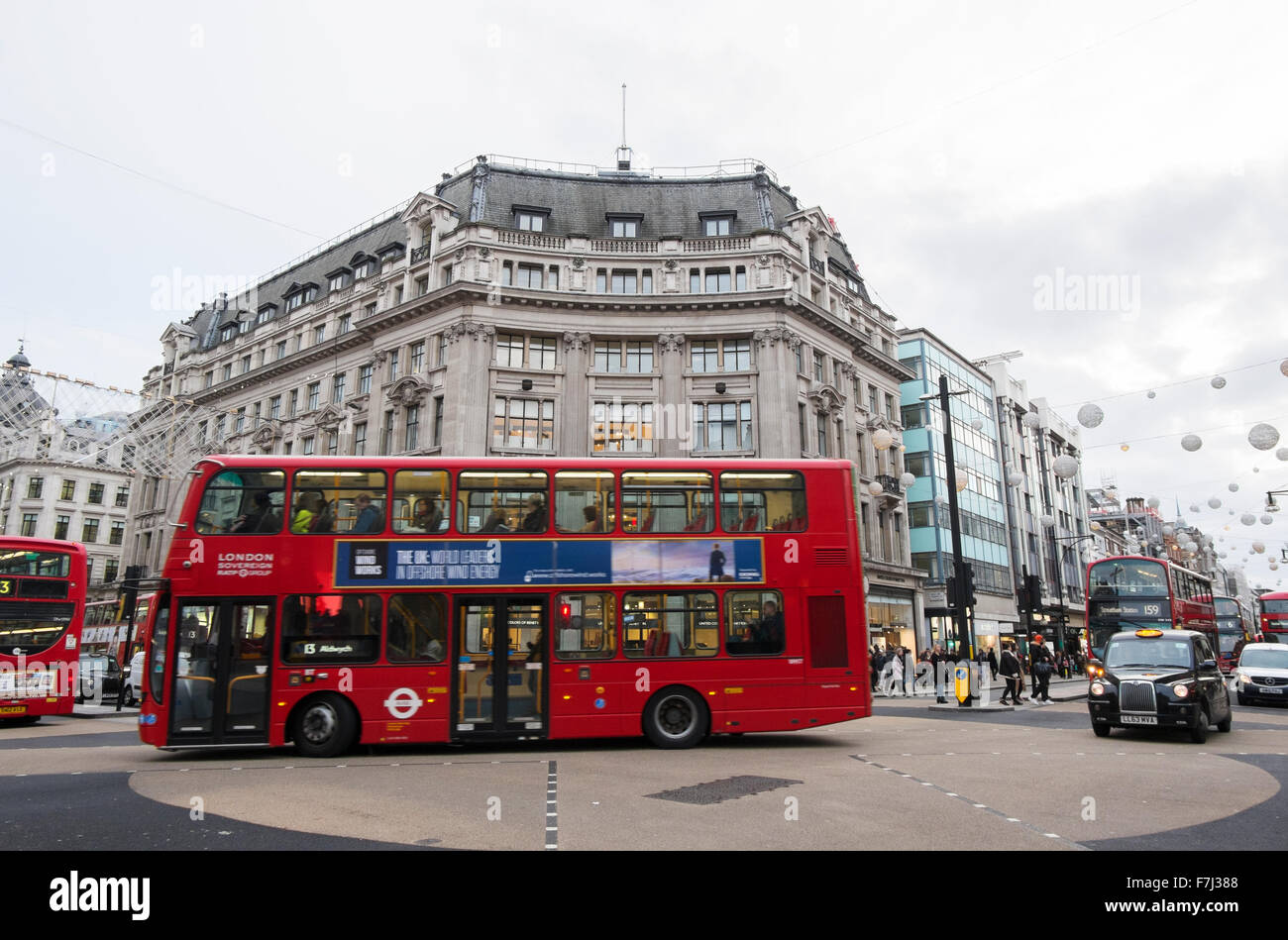 Buses driving through Oxford Circus in London, England, UK Stock Photo ...