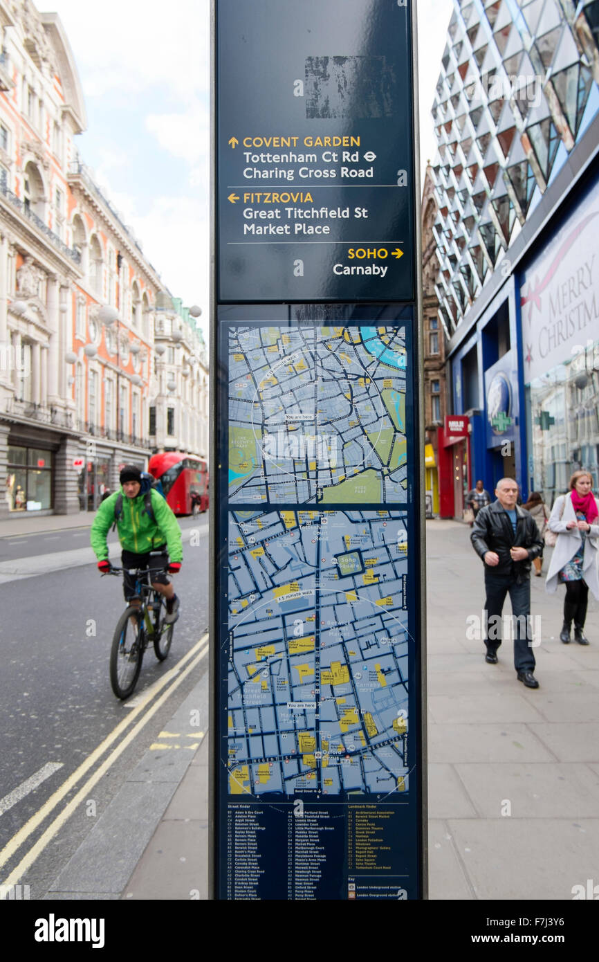 Street sign showing a map of where you are at Oxford Street and ...
