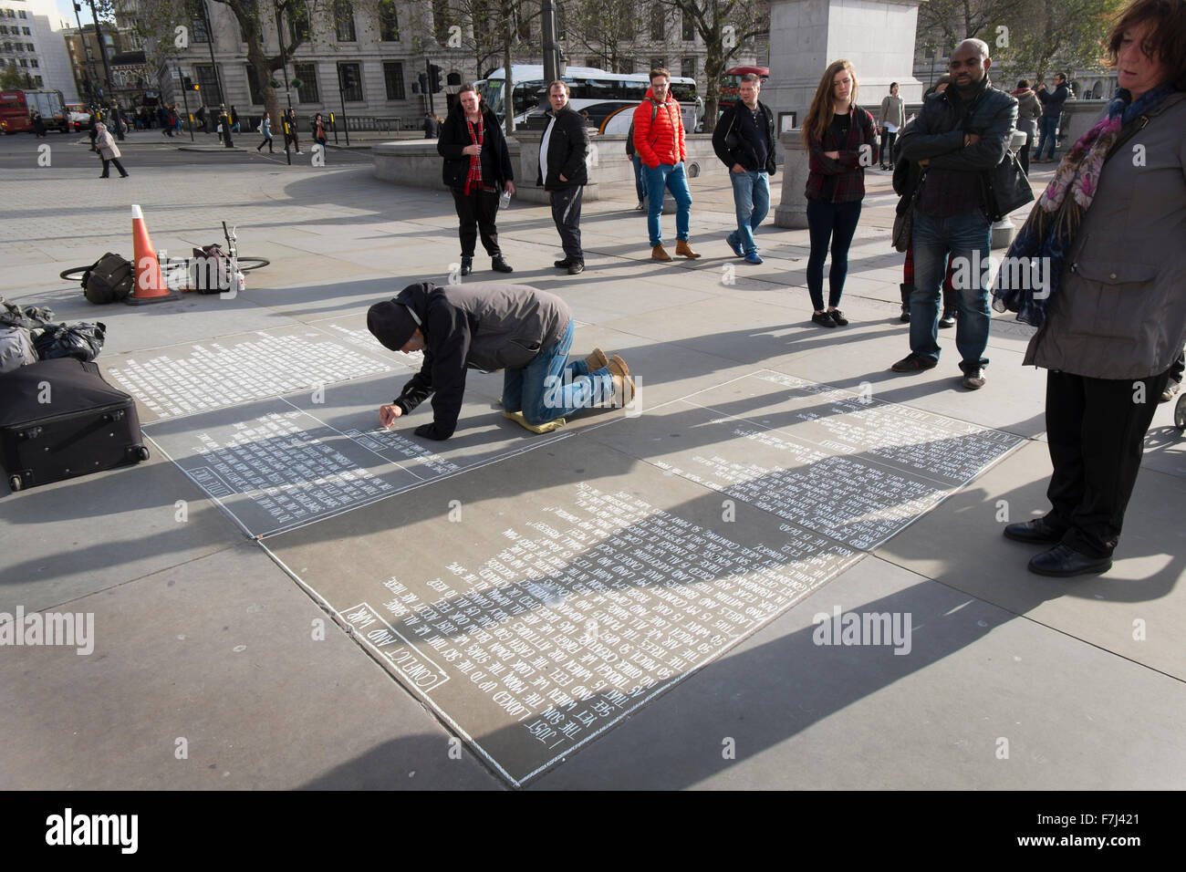 The Homeless Bard, a rough sleeping man writing poetry on the pavement ...