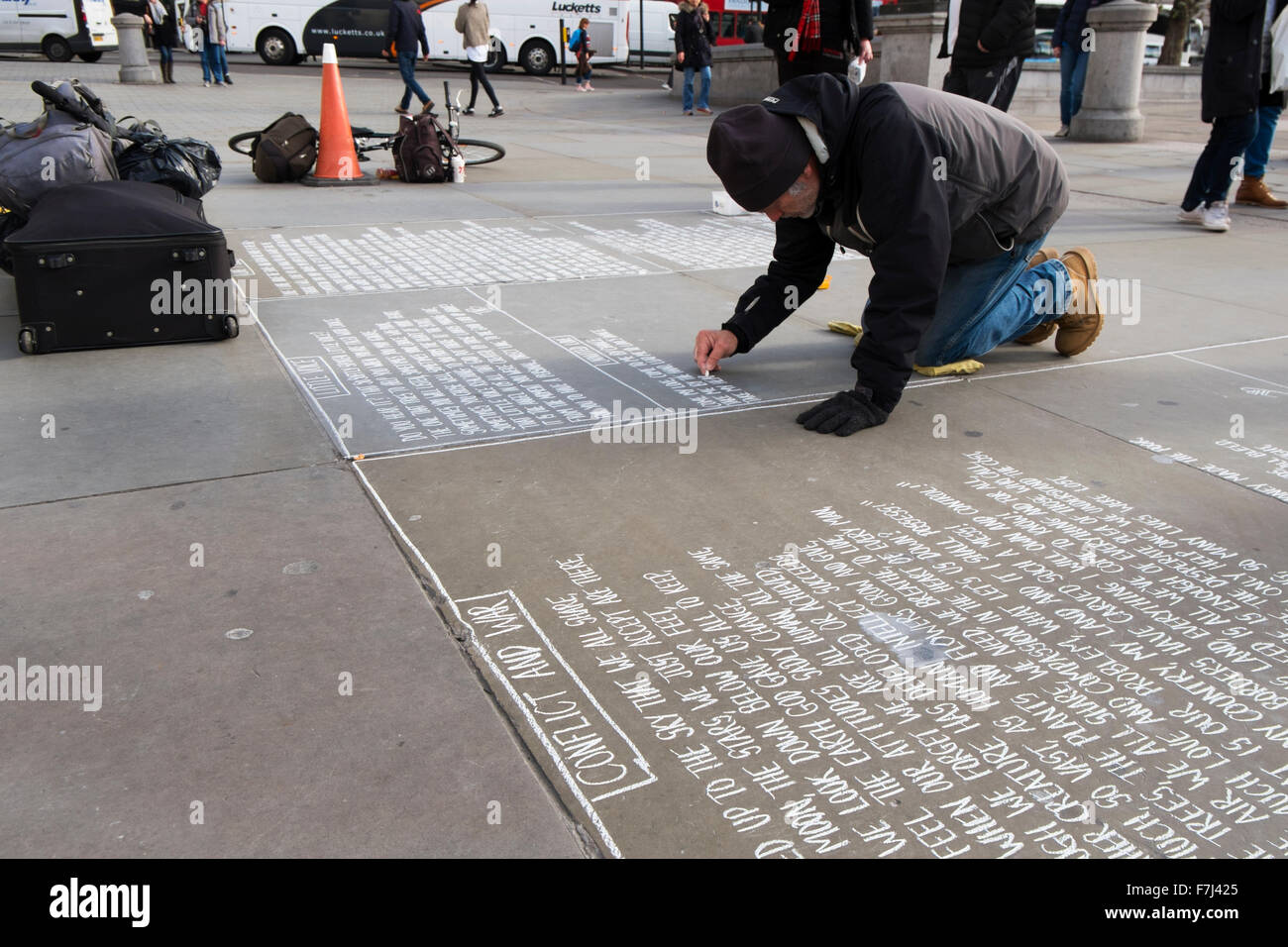 The Homeless Bard, a rough sleeping man writing poetry on the pavement ...
