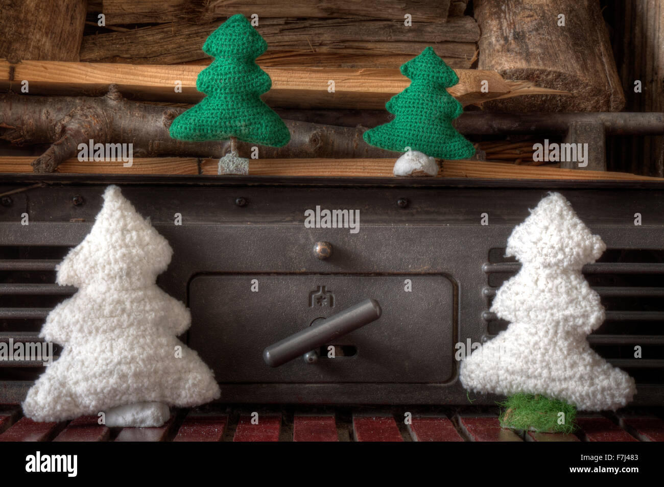 a horizontal frontal view of a decorated fireplace with some Christmas ...
