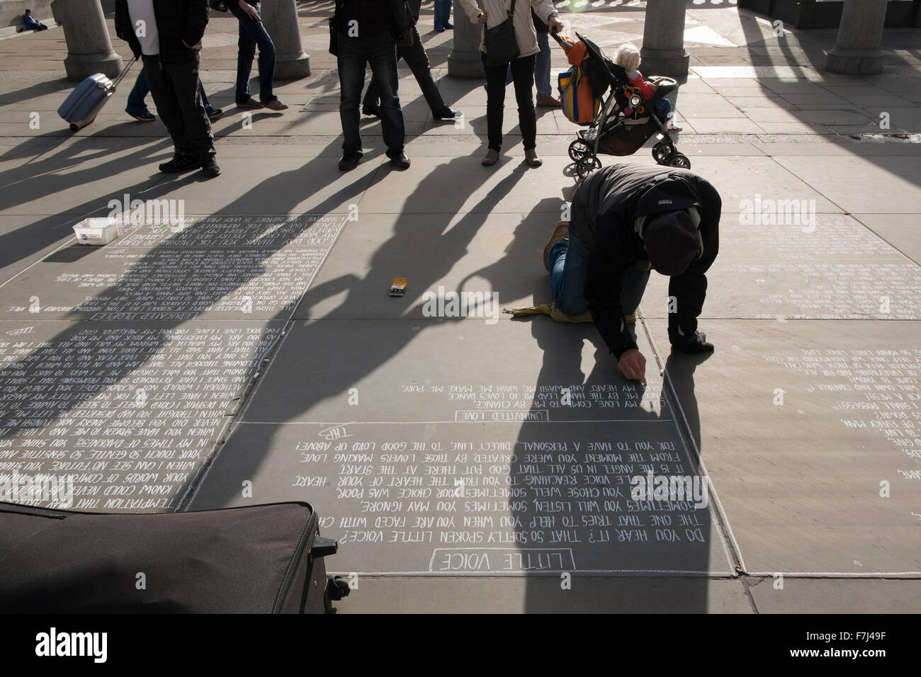 The Homeless Bard, a rough sleeping man writing poetry on the pavement ...
