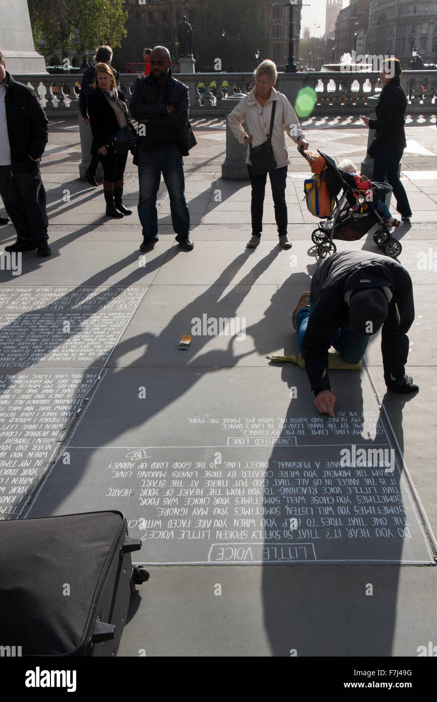 The Homeless Bard, a rough sleeping man writing poetry on the pavement ...