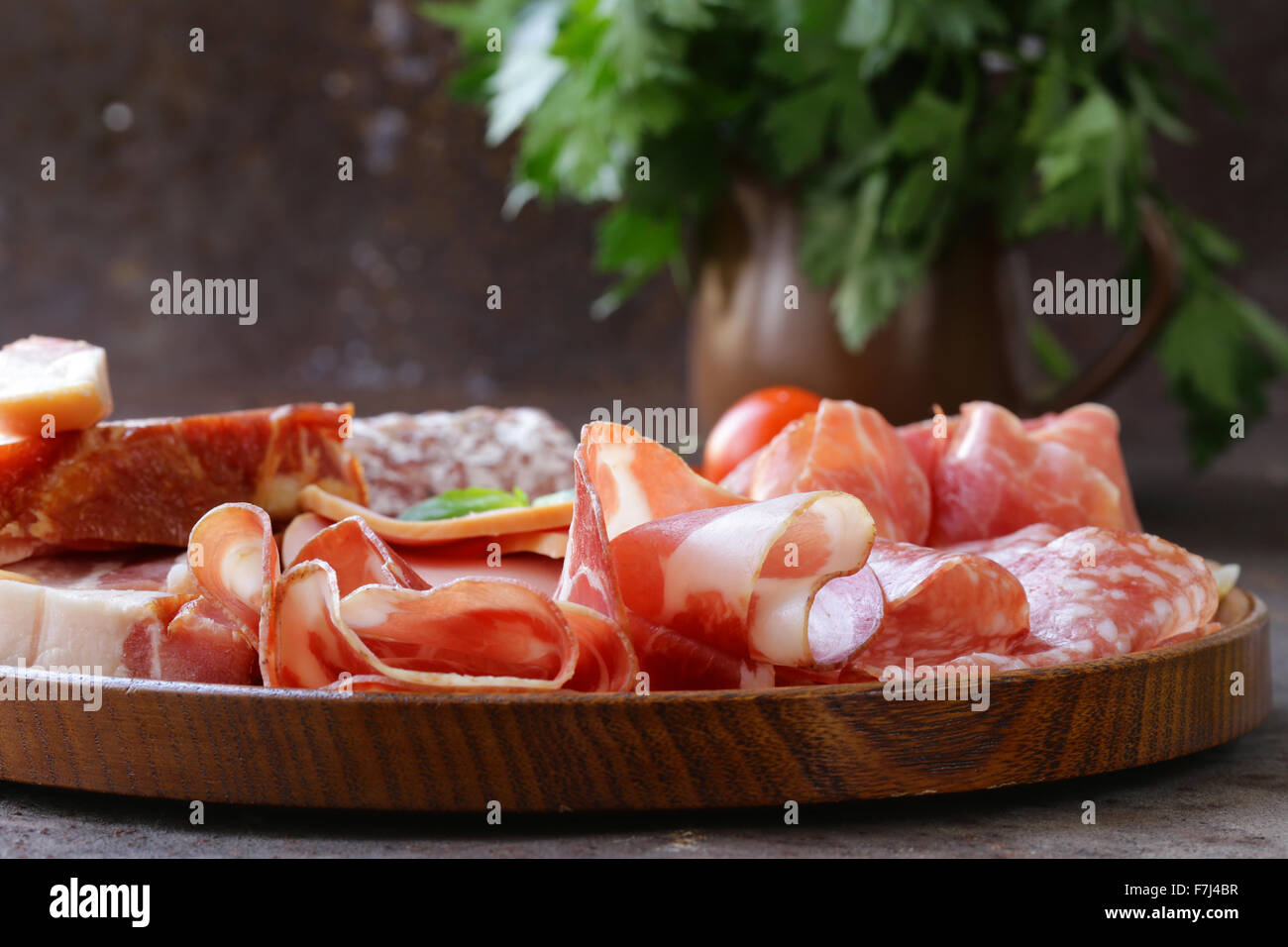 Assorted deli meats - ham, sausage, salami, parma, prosciutto, bacon ...
