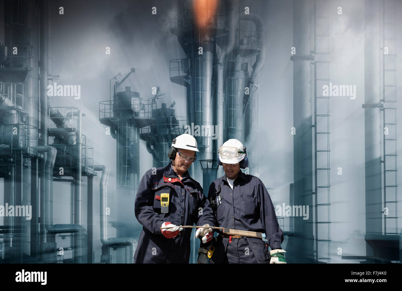 oil and gas workers and refinery industry Stock Photo - Alamy