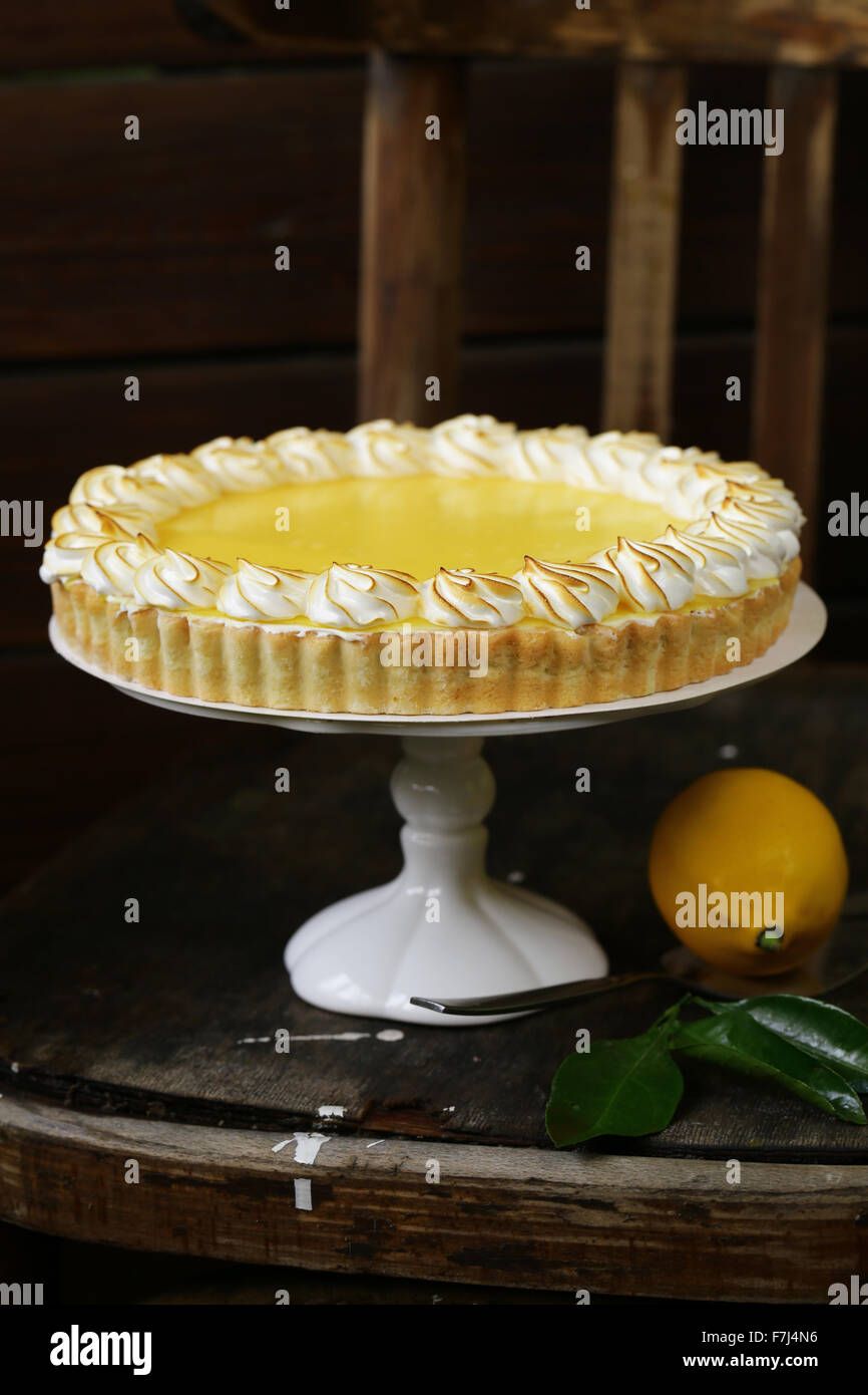 homemade baked lemon tart cake with meringue cream Stock Photo - Alamy