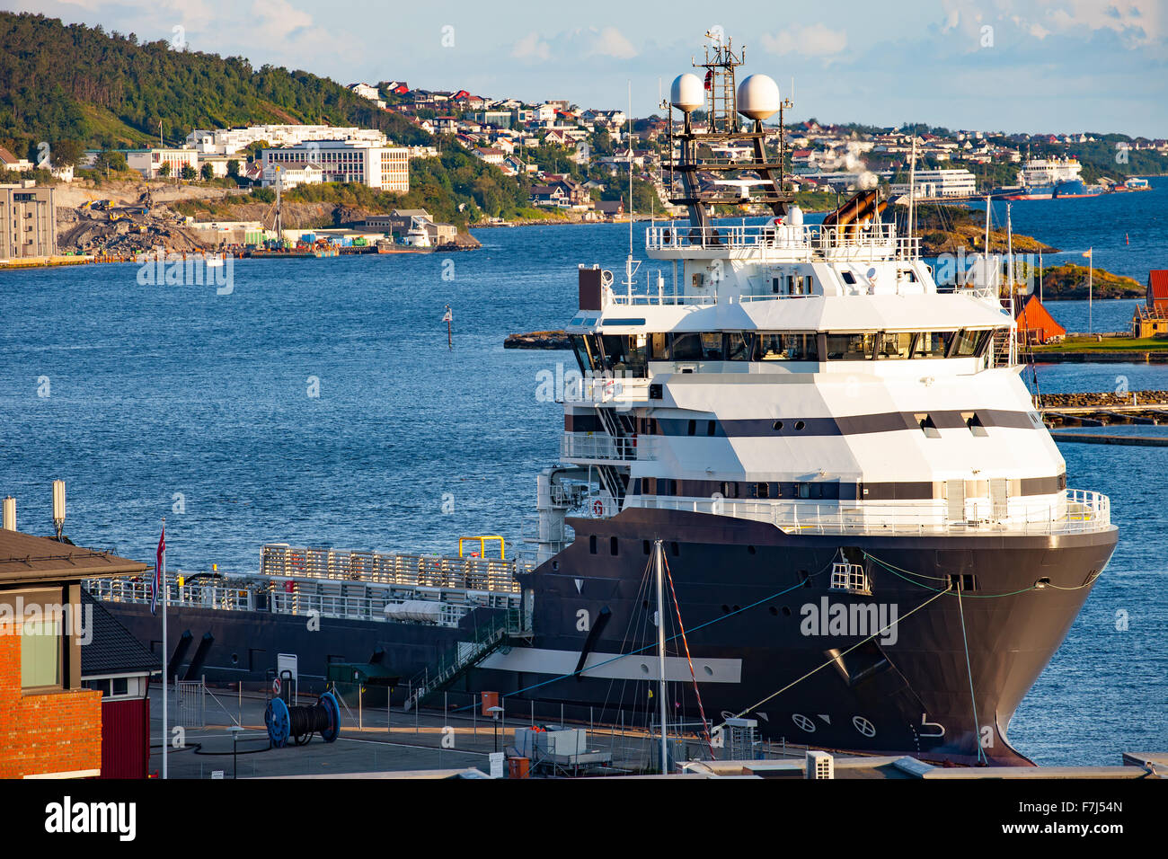 Offshore oil and gas platform supply vessel moored at wharf in ...