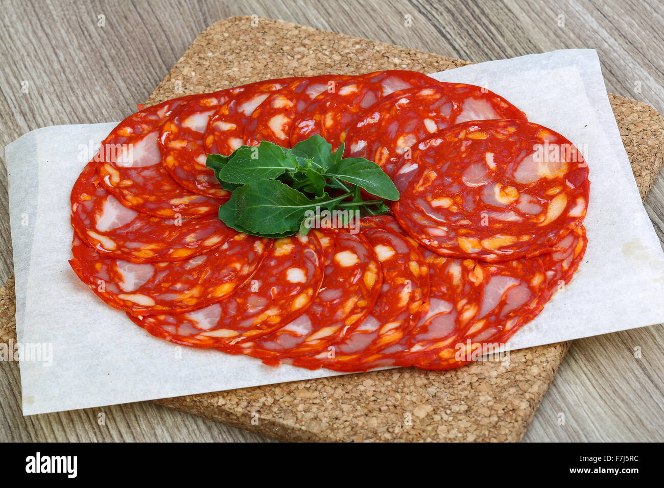Traditional Spanish salami - Chorizo sausage on the wood background ...