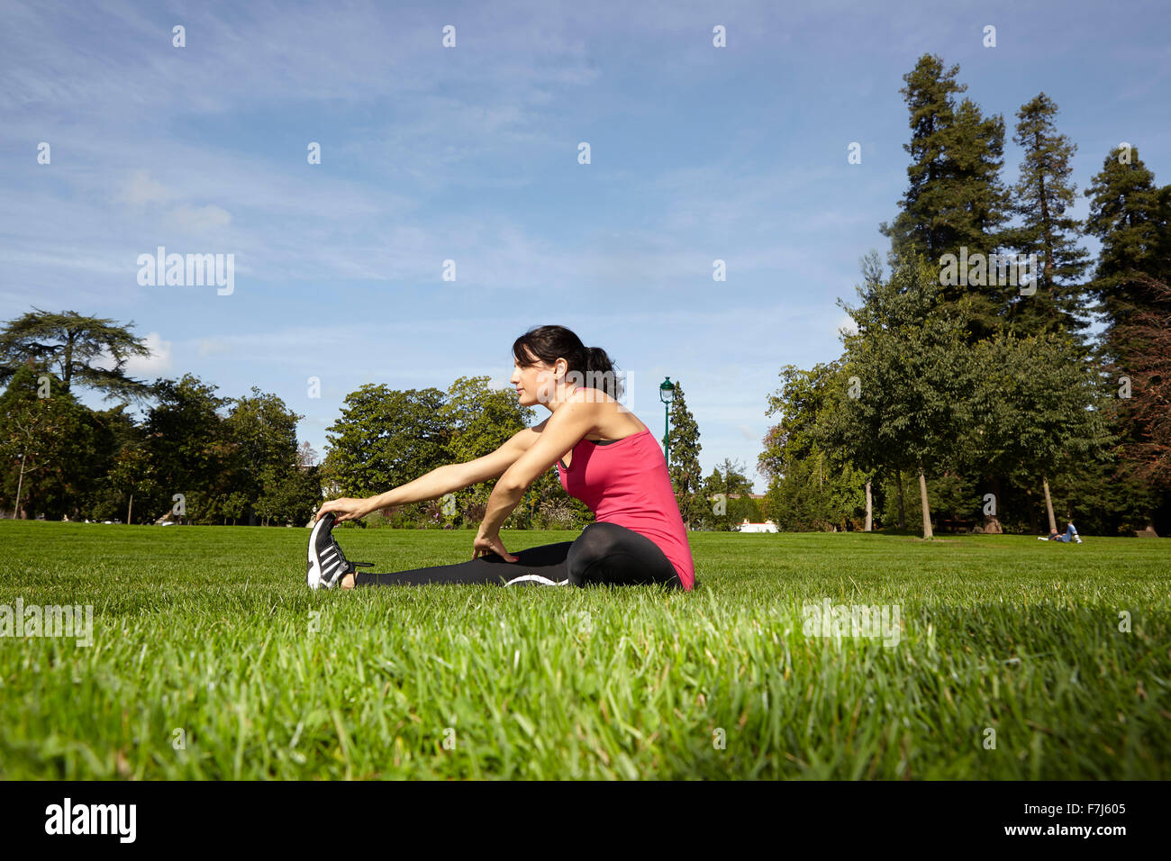 WOMAN PRACTISING SPORT Stock Photo - Alamy