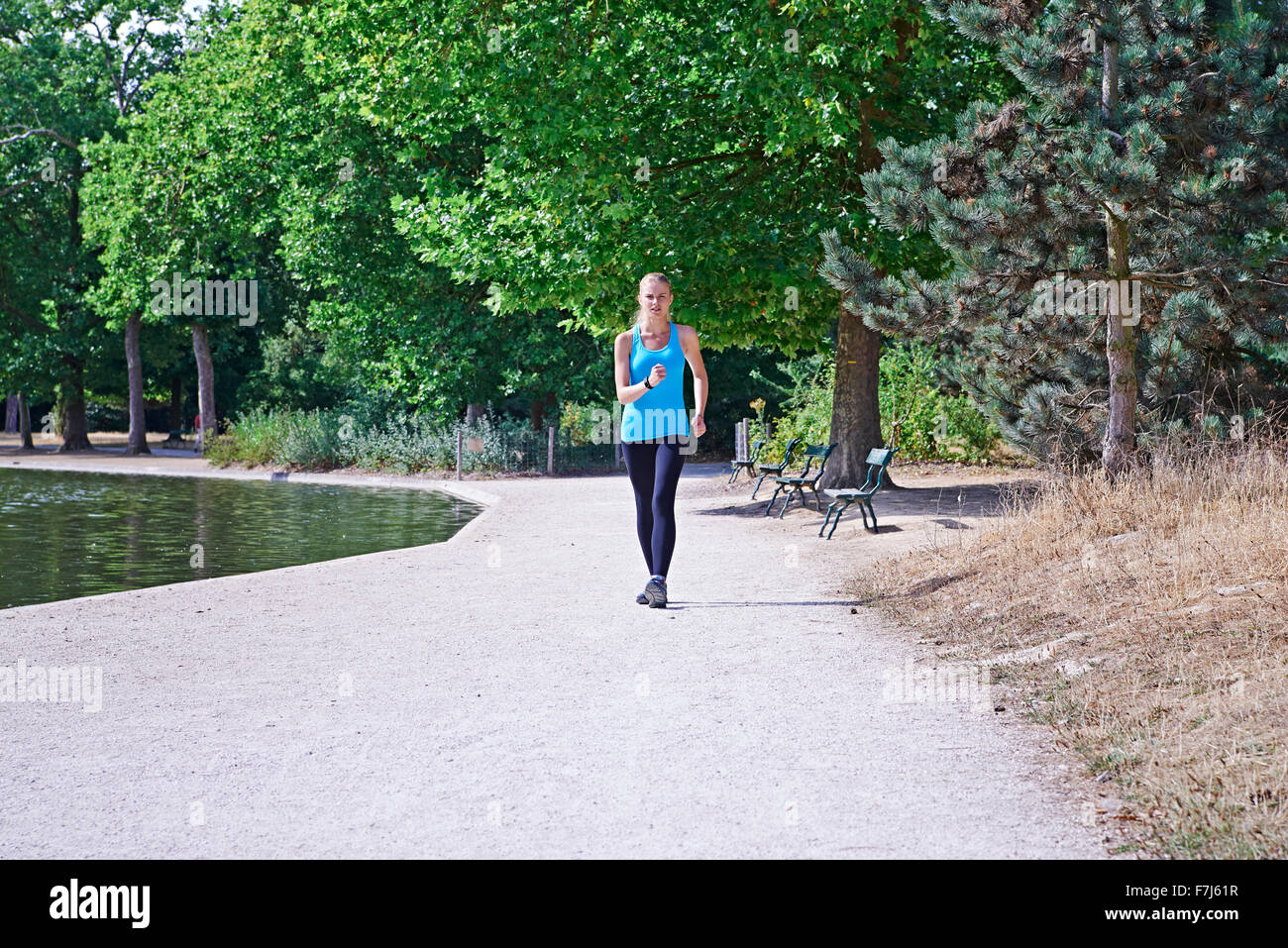 WOMAN PRACTISING SPORT Stock Photo - Alamy
