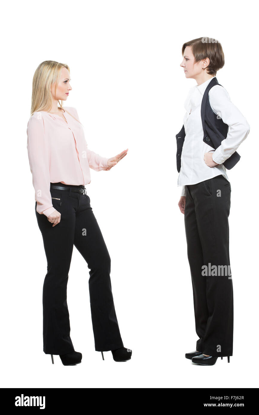 two businesswomen, isolated on white background. body language ...