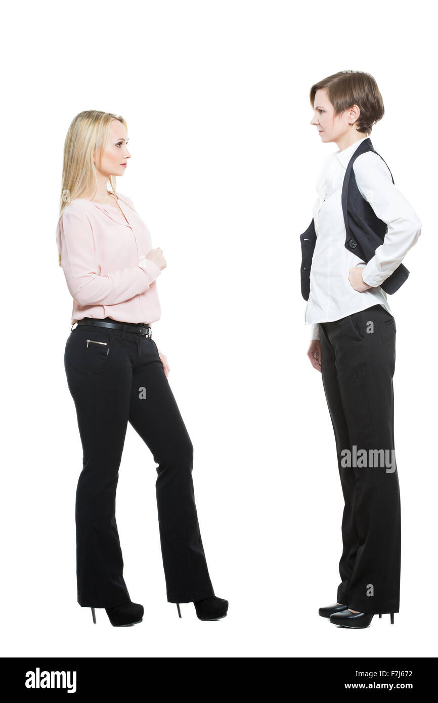 two businesswomen, isolated on white background. body language ...
