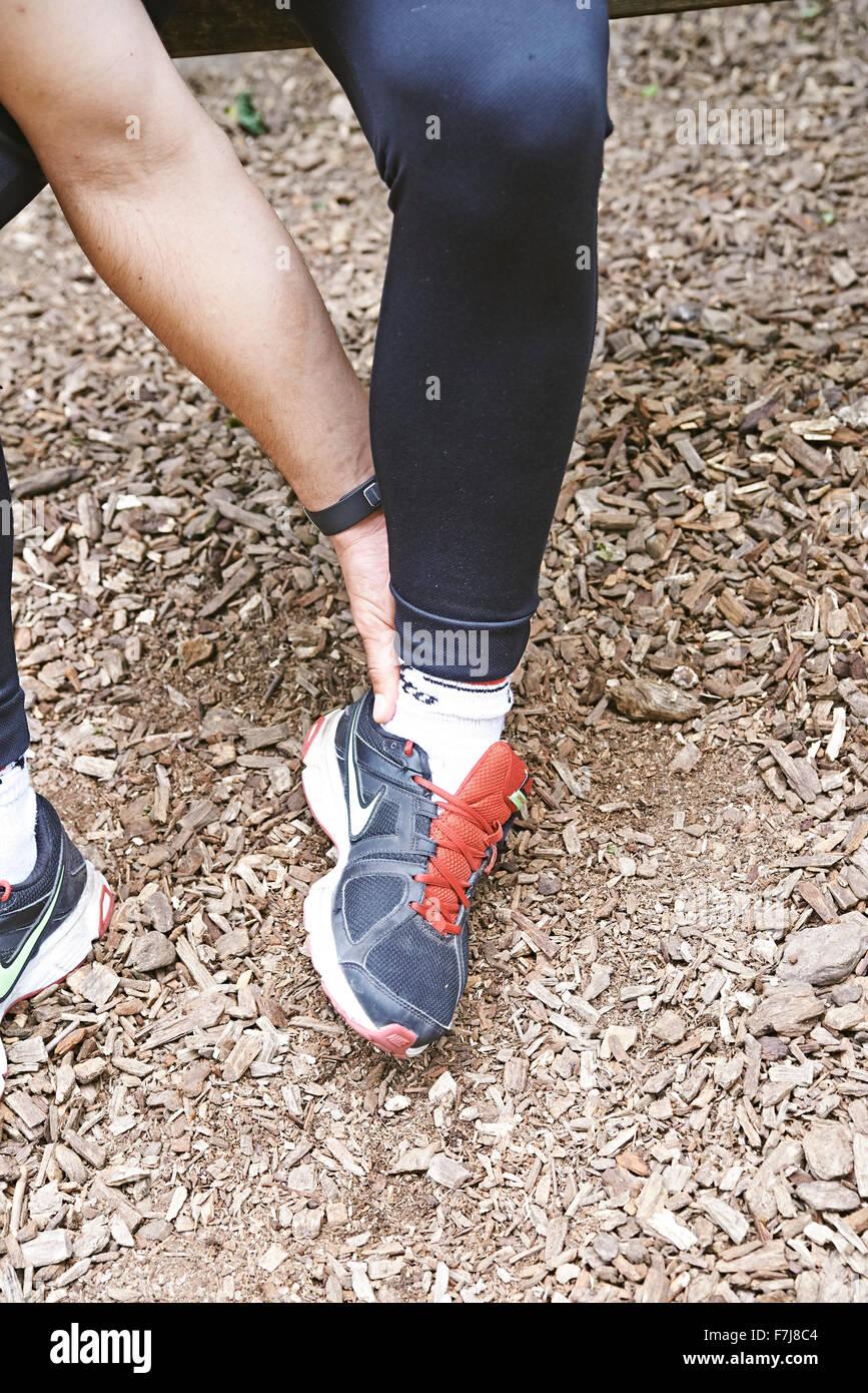 MAN WITH ANKLE PAIN Stock Photo - Alamy