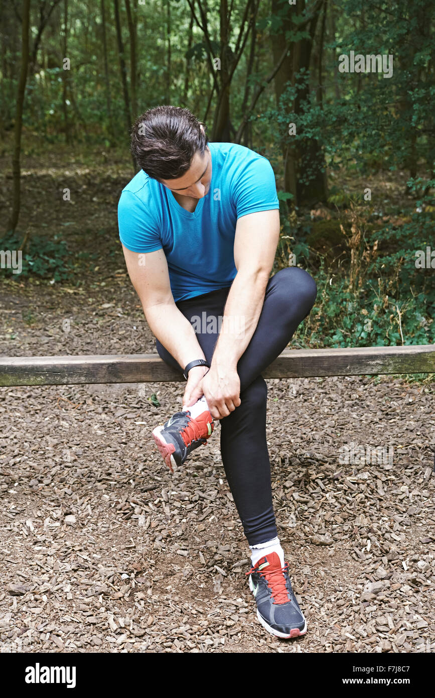 MAN WITH ANKLE PAIN Stock Photo - Alamy