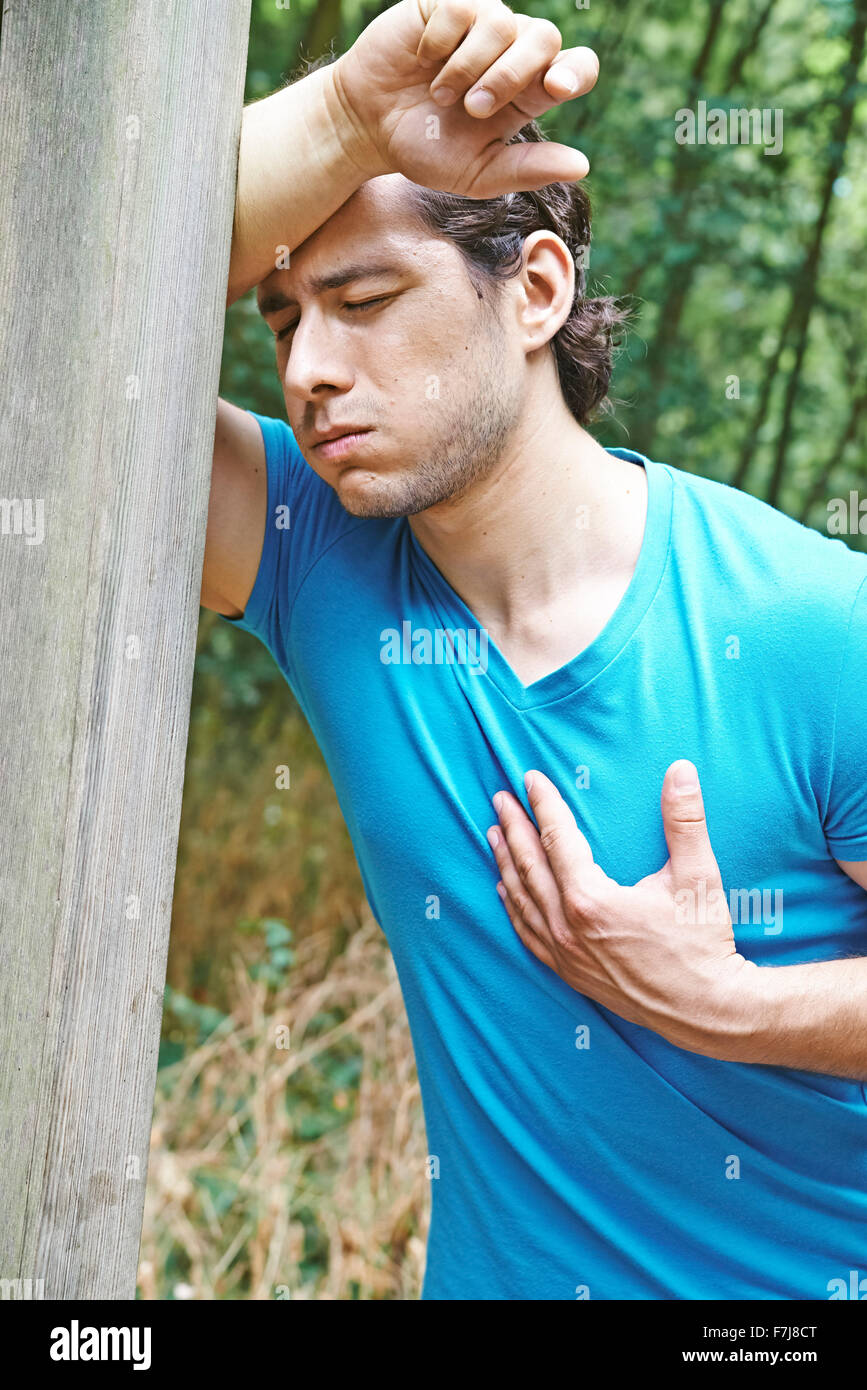 MAN WITH CHEST PAIN Stock Photo - Alamy