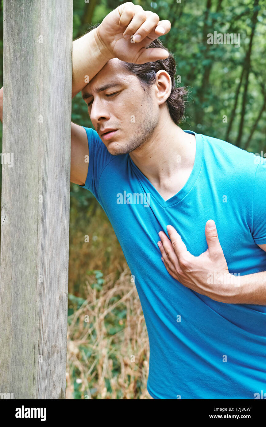 MAN WITH CHEST PAIN Stock Photo - Alamy