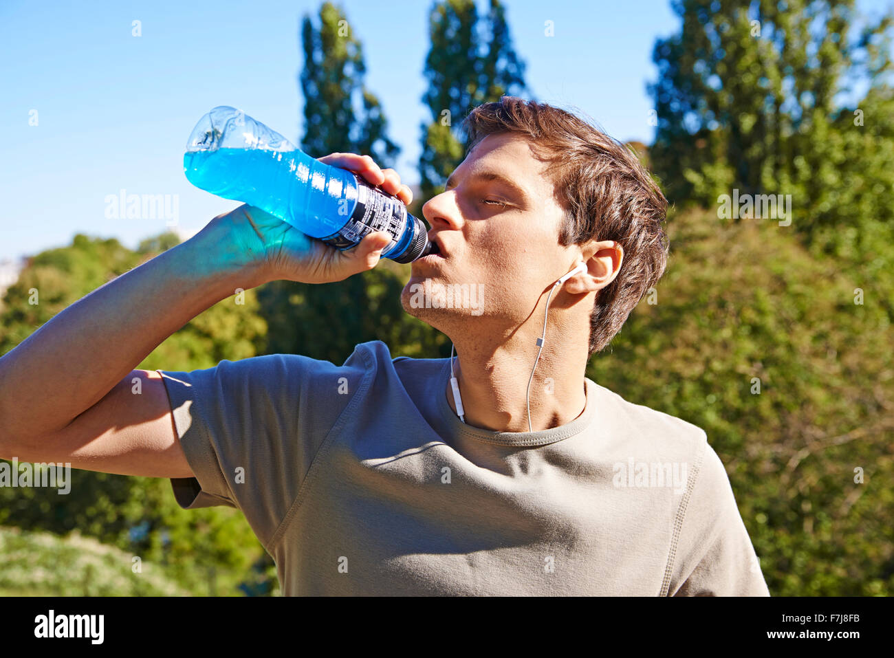 MAN WITH A DRINK Stock Photo - Alamy