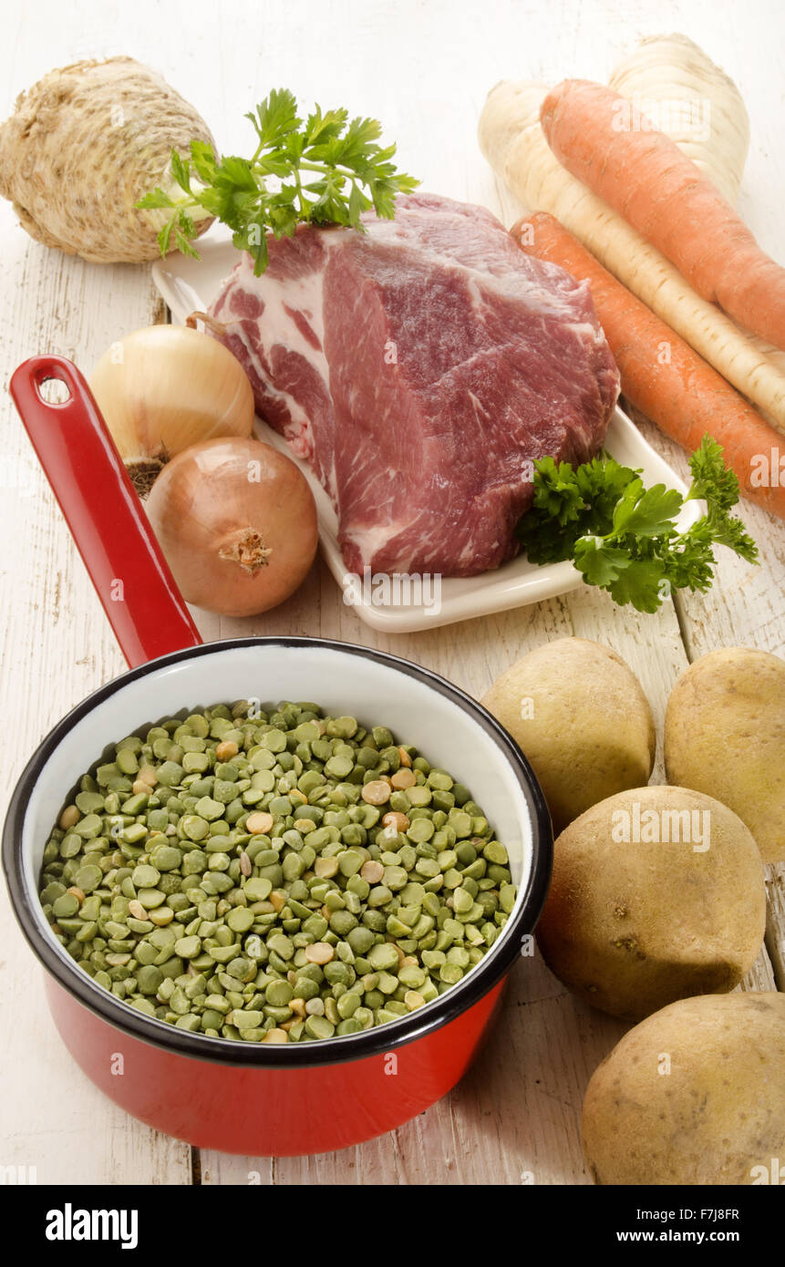 ingredients to make vegetable soup with green split pea Stock Photo - Alamy