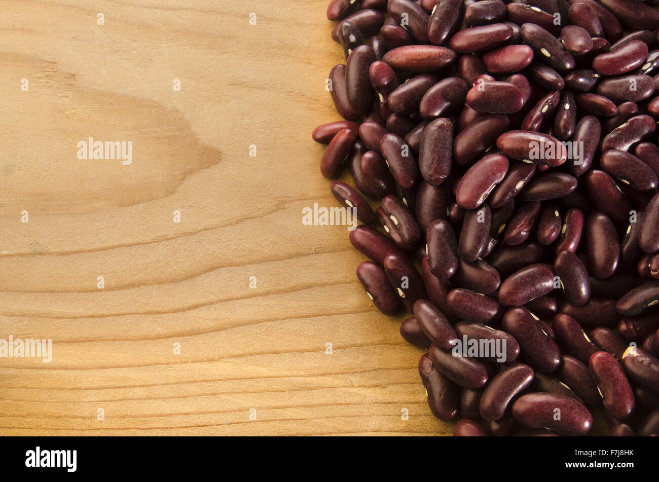 organic red beans on a rustic table Stock Photo - Alamy