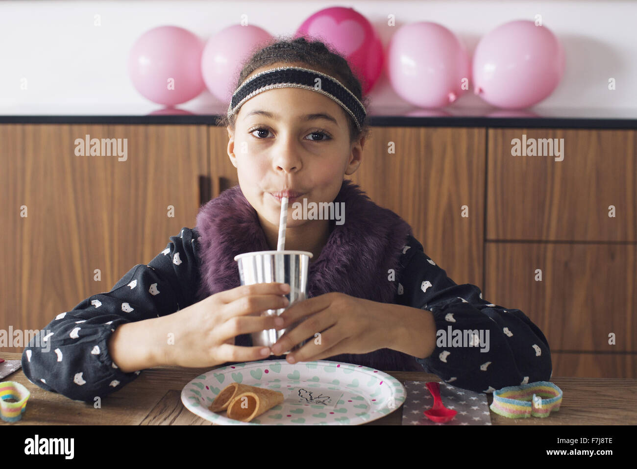 Child drinking through straw hi-res stock photography and images - Alamy