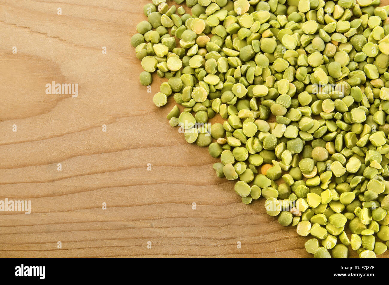 organic green split pea on rustic wood Stock Photo - Alamy