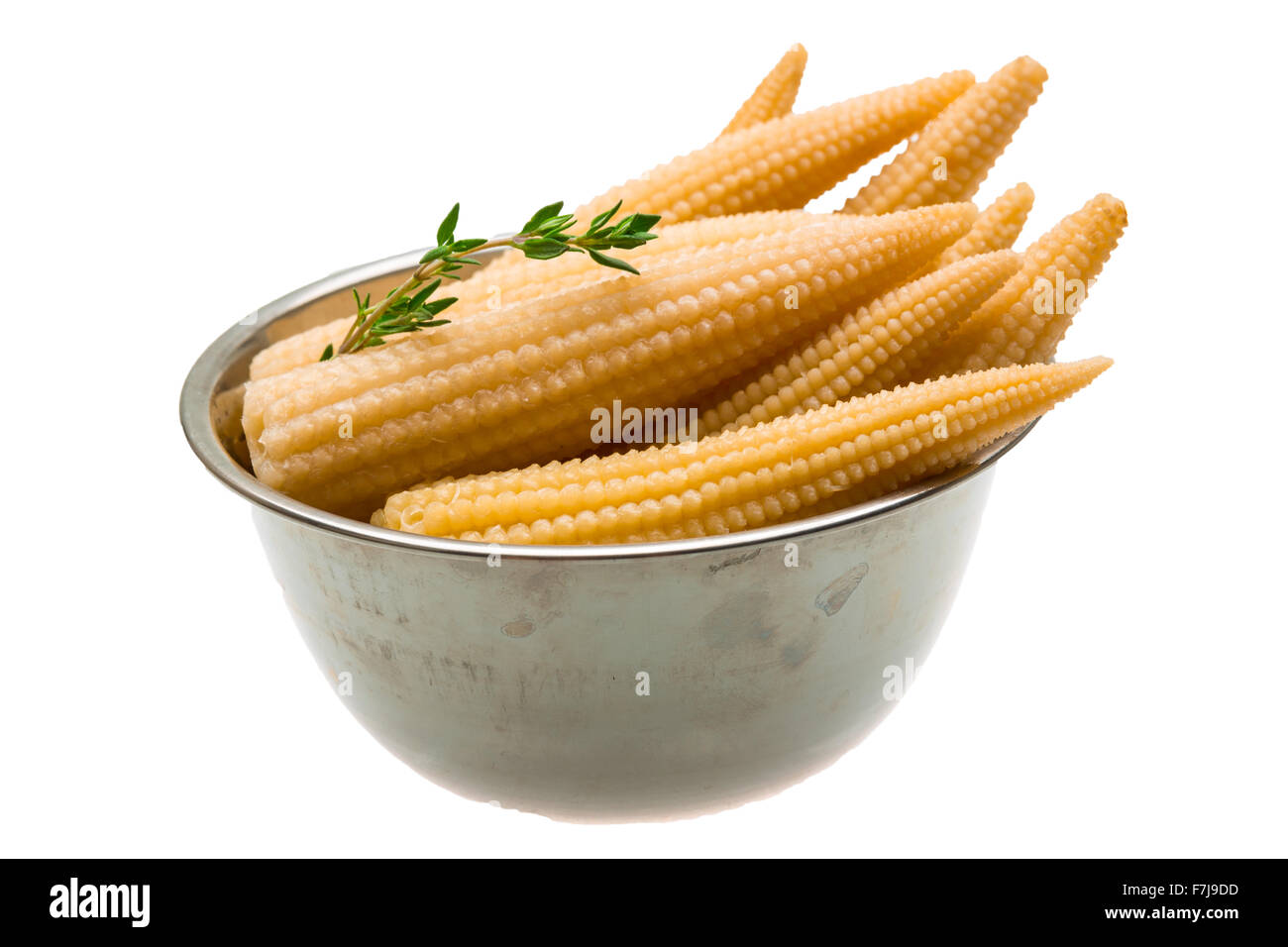 Baby corn with thyme Stock Photo - Alamy