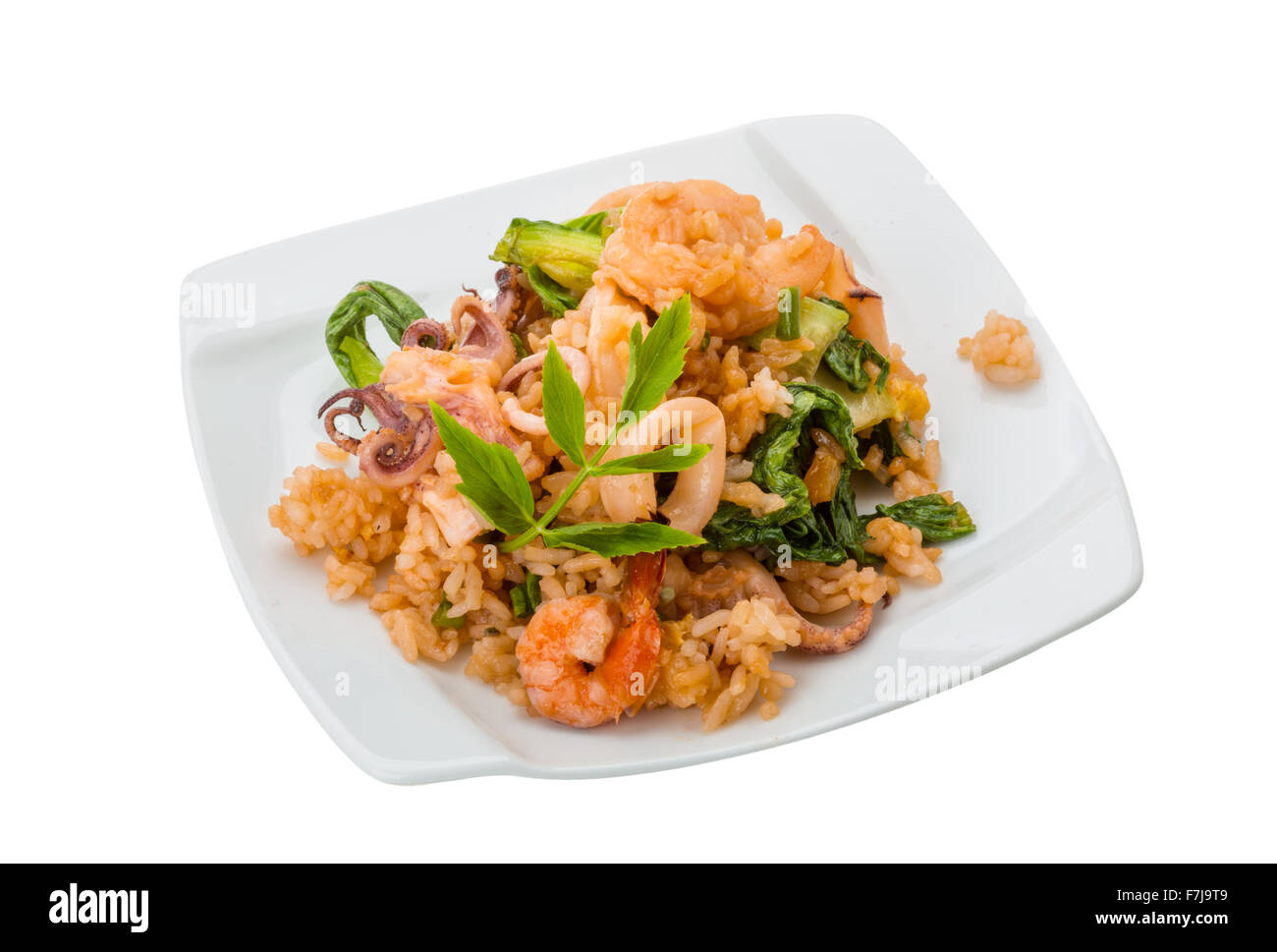Rice with seafood isolated on white Stock Photo - Alamy
