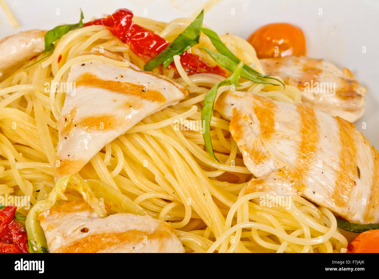 close-up of plate of pasta and chicken Stock Photo - Alamy