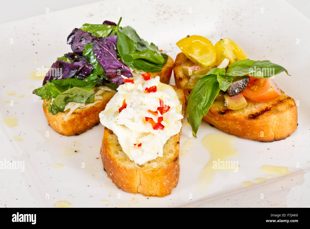 different colored Canapes on a white background Stock Photo - Alamy