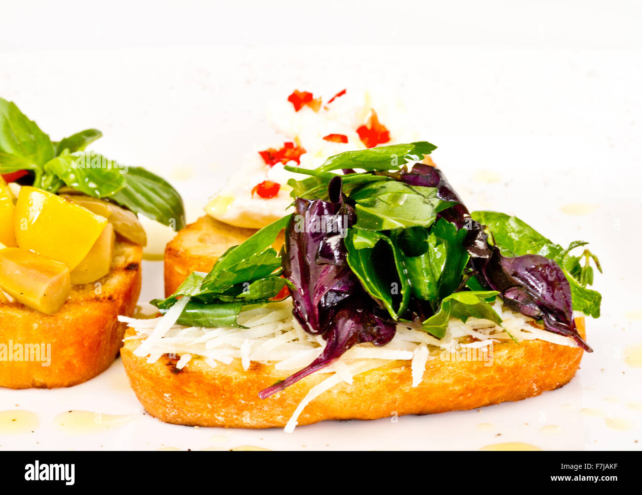 different colored Canapes on a white background Stock Photo - Alamy