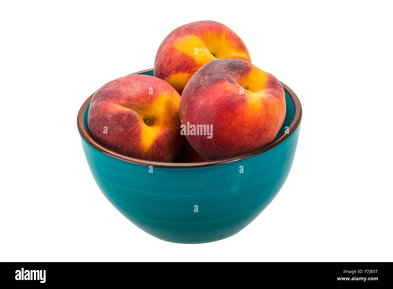 Peaches in the bowl isolated Stock Photo - Alamy