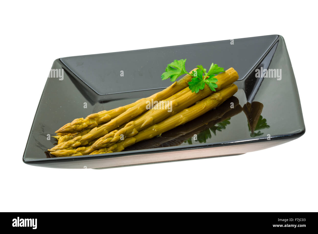 Boiled asparagus with parsley Stock Photo - Alamy