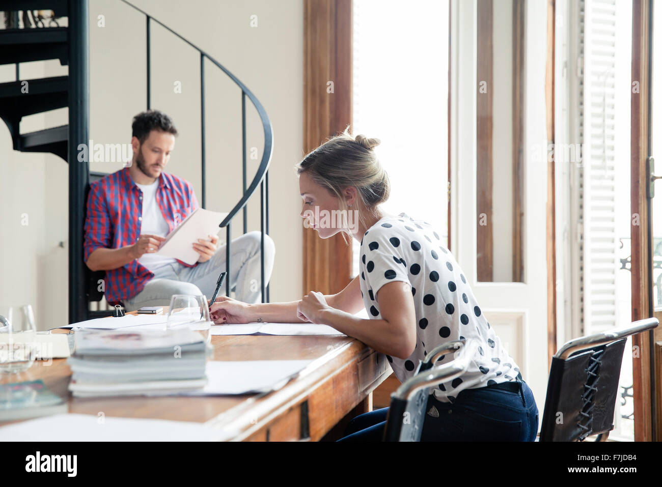 Engrossed in work hi-res stock photography and images - Alamy