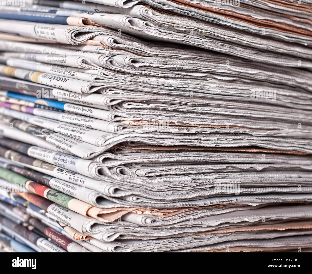 stack of daily newspapers background Stock Photo - Alamy