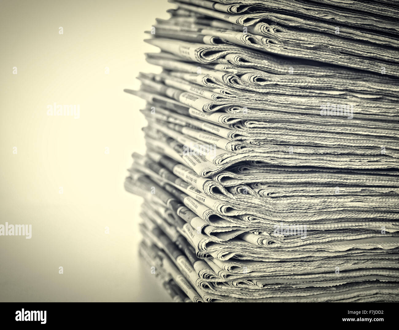 stack of daily newspapers background Stock Photo - Alamy