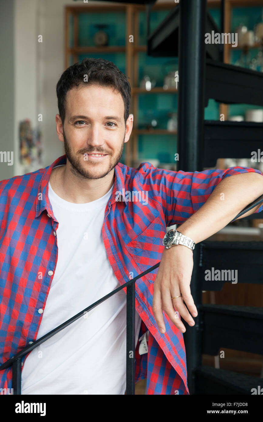 Man leaning on handrail hi-res stock photography and images - Alamy