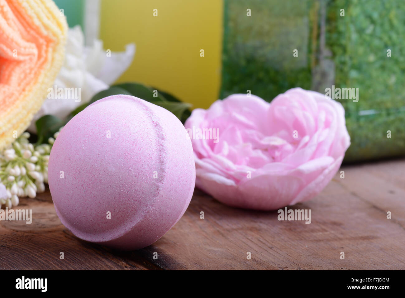 Spa theme with candles and flowers on wooden background Stock Photo - Alamy