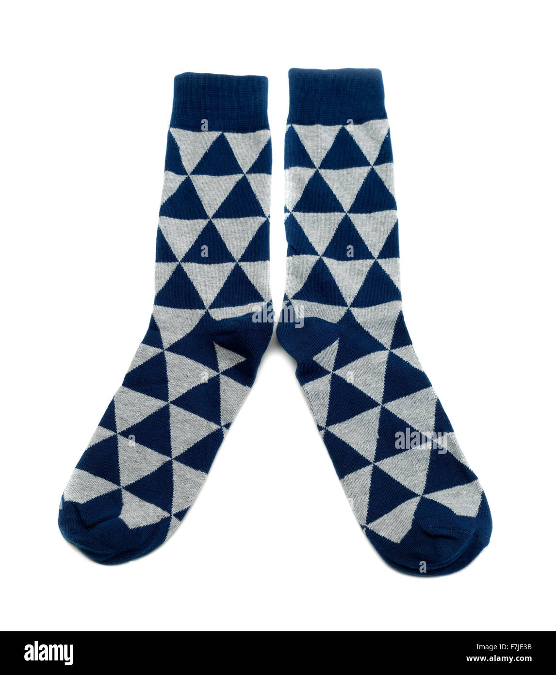 A pair of socks in a diamond pattern, blue and gray. Isolate on white ...