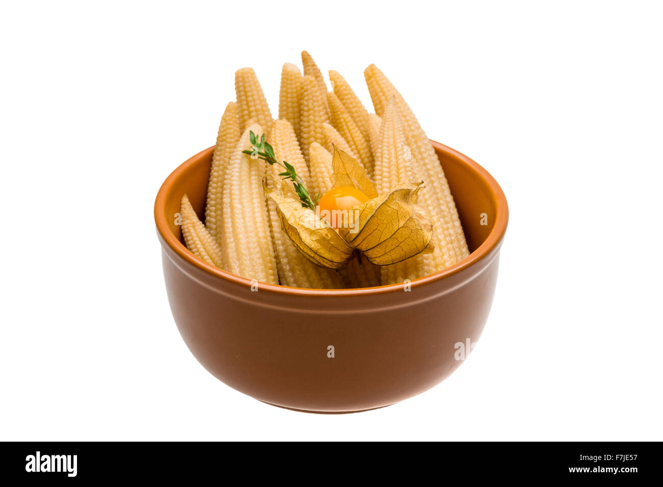 Baby corn with thyme Stock Photo - Alamy