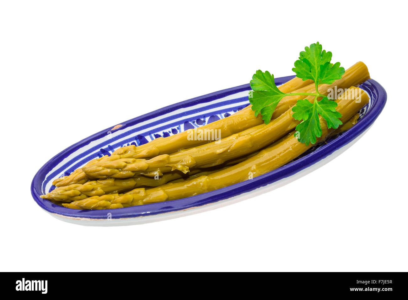 Boiled asparagus with parsley Stock Photo - Alamy