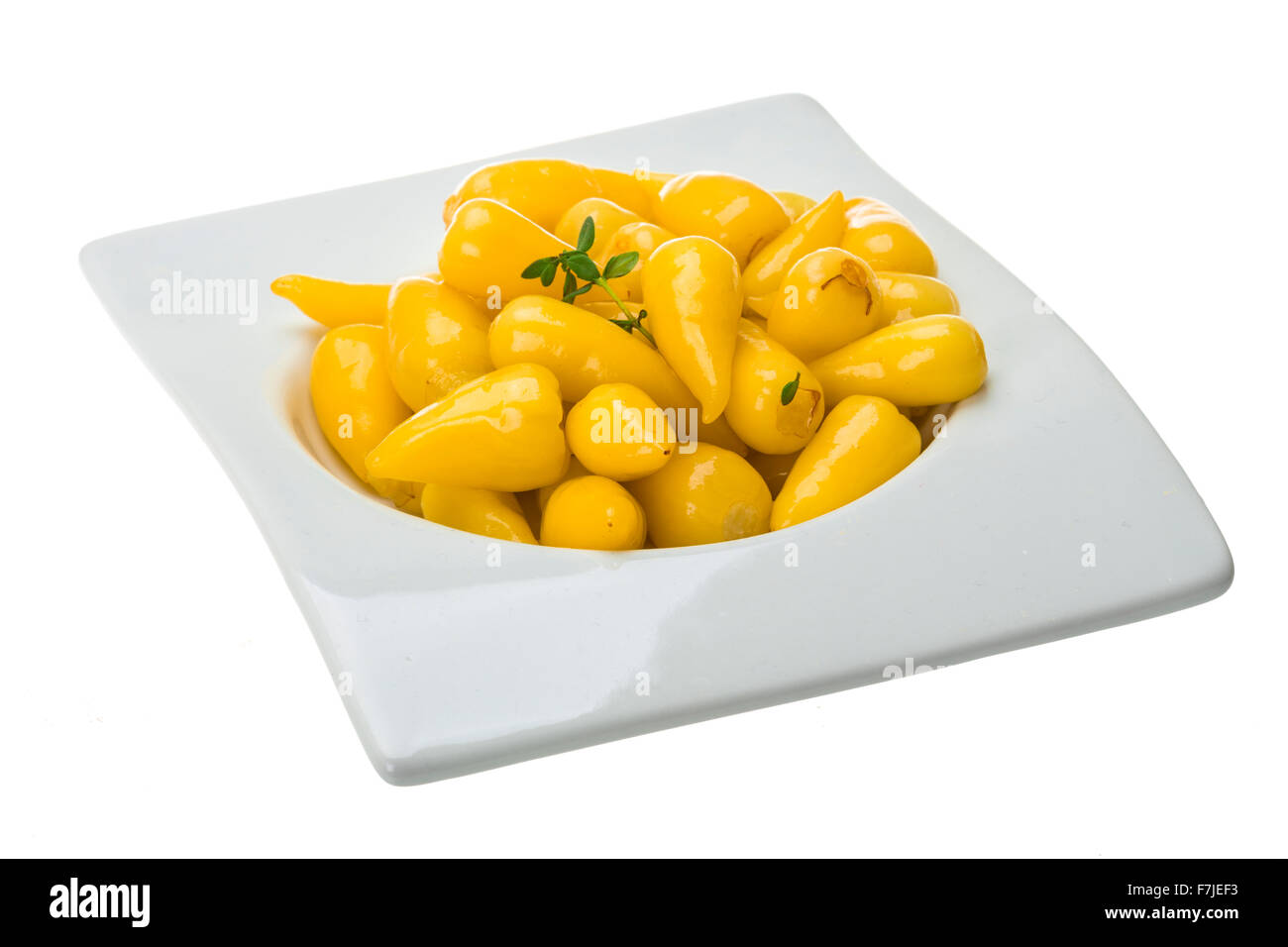 Marinated yellow pepper isolated Stock Photo - Alamy