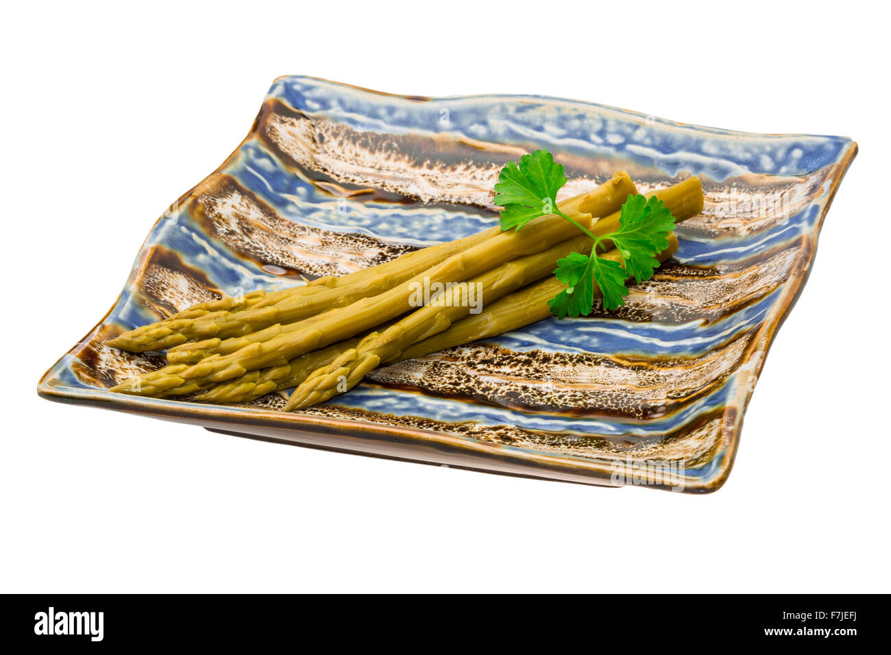 Boiled asparagus with parsley Stock Photo - Alamy