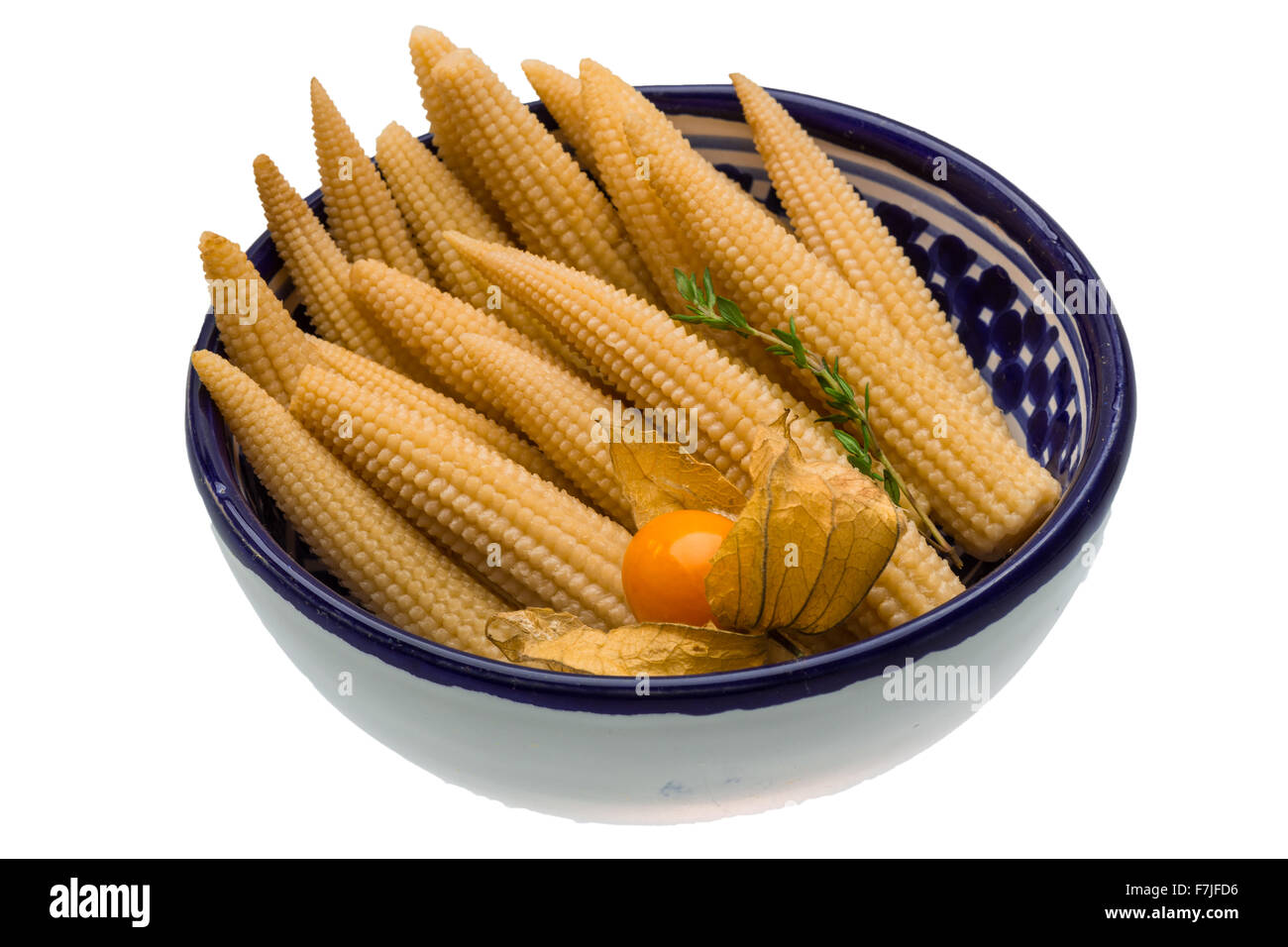 Baby corn with thyme Stock Photo - Alamy