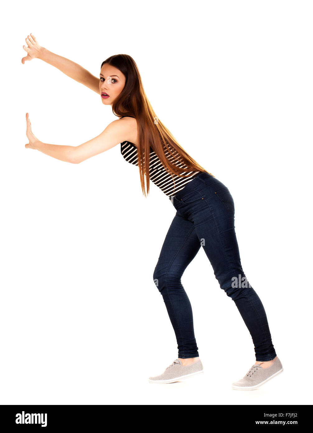 Girl pushing wall hi-res stock photography and images - Alamy