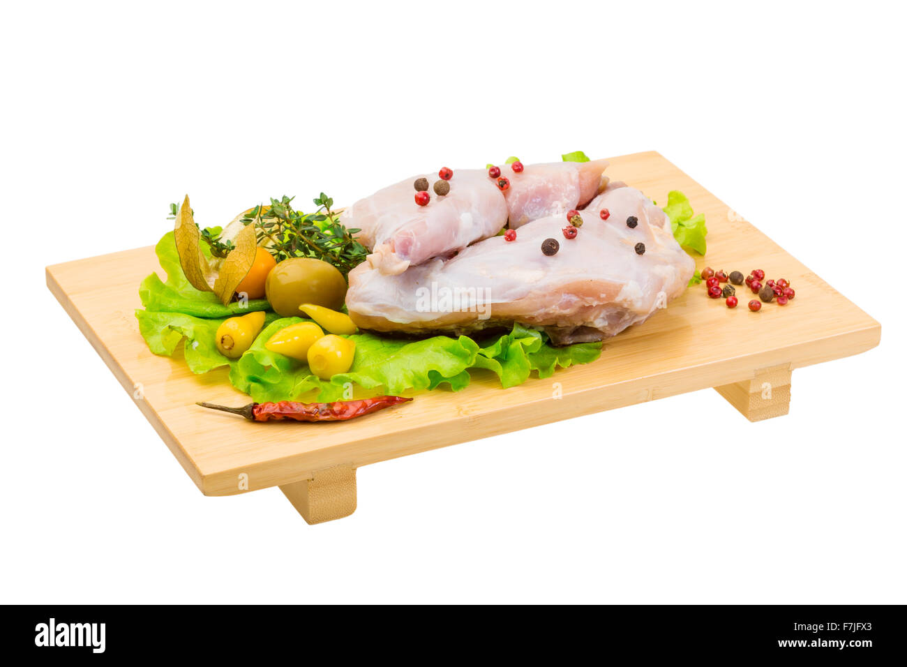 Raw rabbit meat with herbs and spices Stock Photo - Alamy