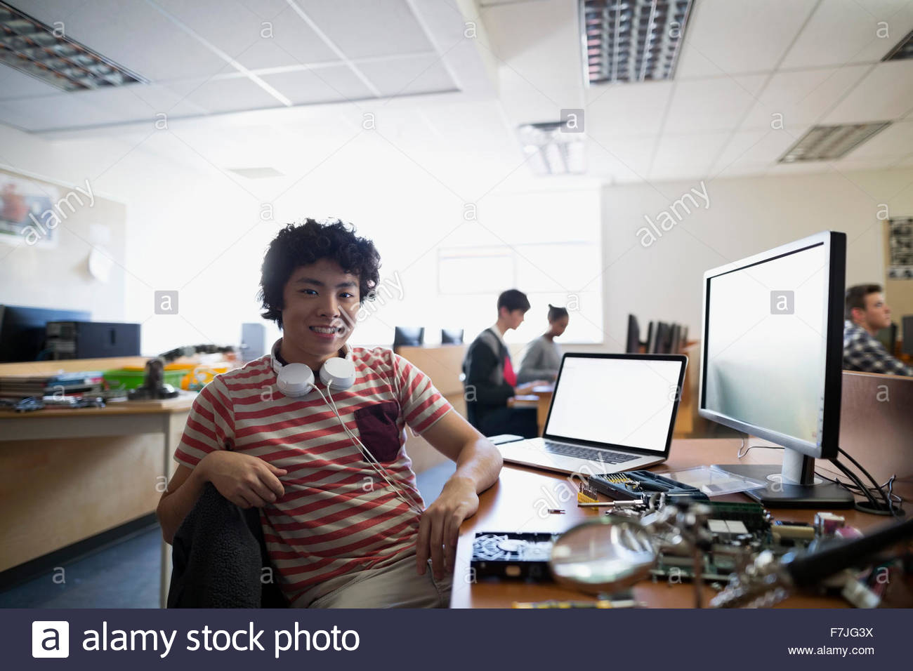 Portrait confident high school student in computer class Stock Photo ...