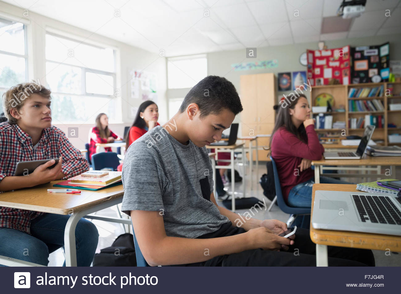 Student Texting Under Desk