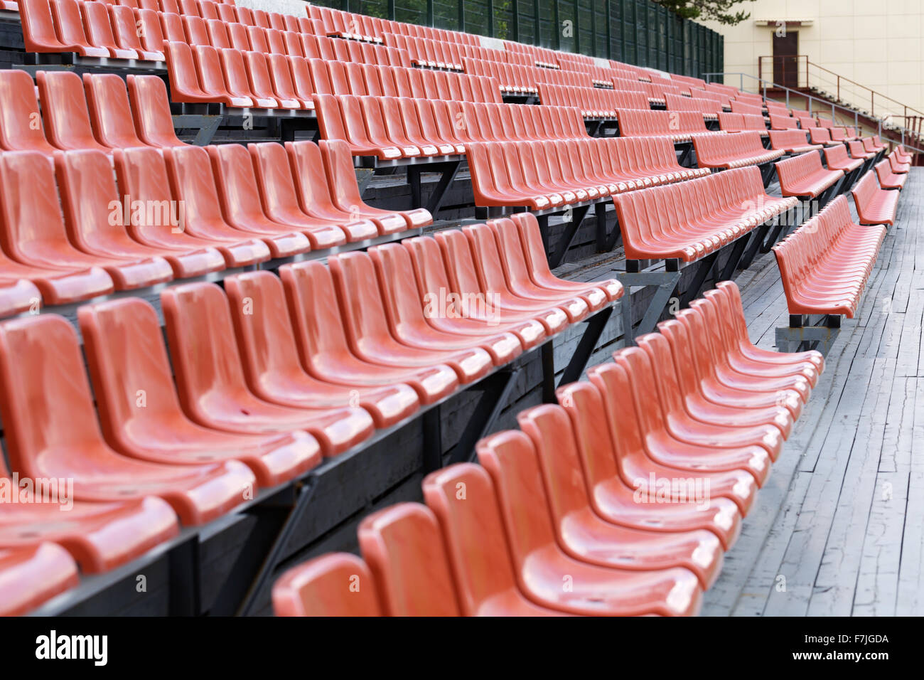 stadium curve, brown seat on stadium steps bleacher Stock Photo - Alamy