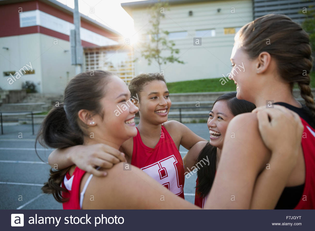 Women athletes hugging hi-res stock photography and images - Alamy